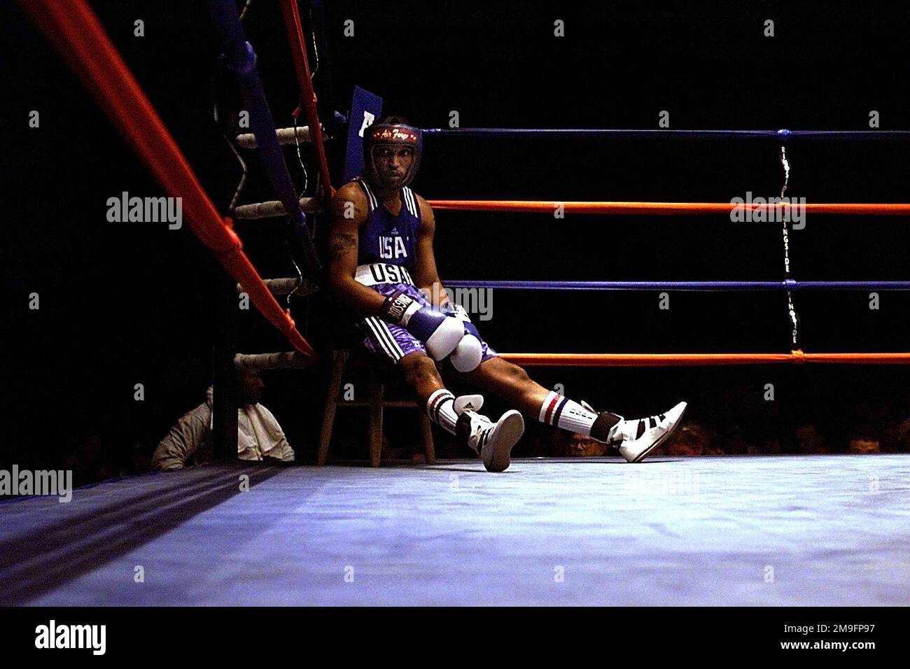 US Air Force boxer Kevin Legget rests druing a technical time out to ...