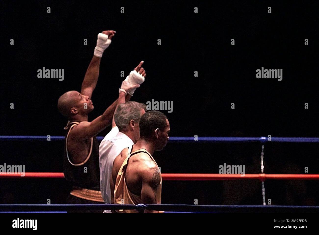 US Army boxer DeAndrey Abron (Background) shows his excitement after ...