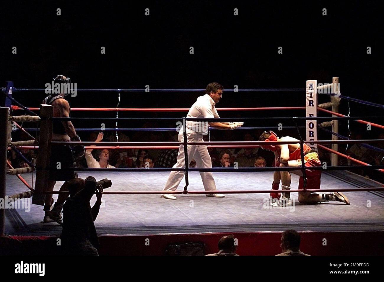US Marine Corps boxer Christopher Tillman (On one knee) receives an ...