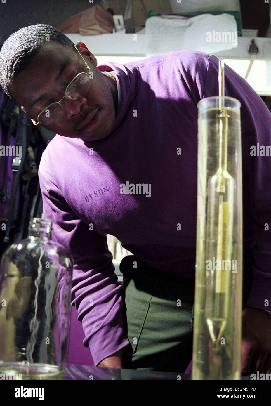 Aviation Boatswain's Mate (Fuels) Third Class Jerroll Dyson tests the ...
