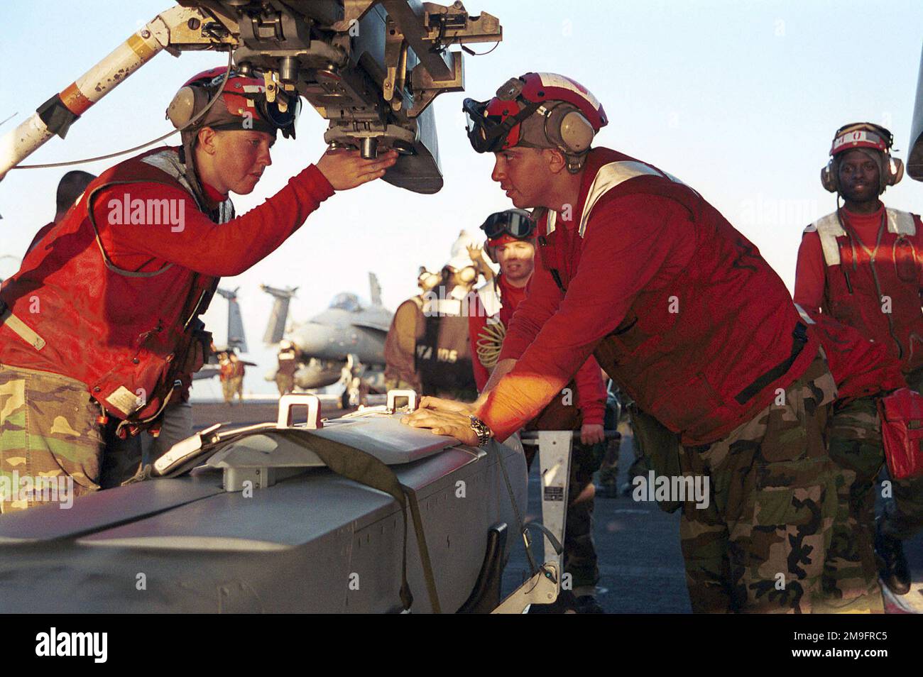 Lance Corporals Patrick Gay, Michael Greenier and Robert Firth load ...