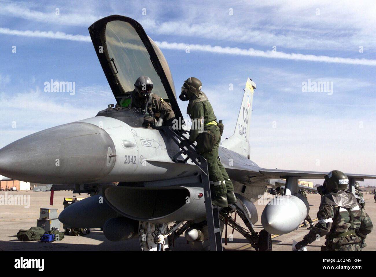 US Air Force Lieutenant Jeff Cain prepares to get out of his F-16 ...