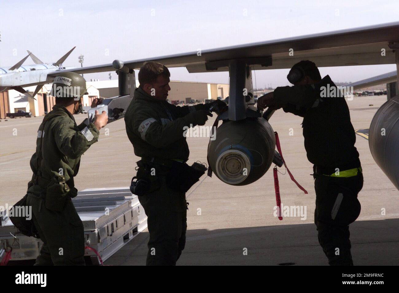 Load crew team 51 from the 524th Fighter Squadron loads munitions on to ...