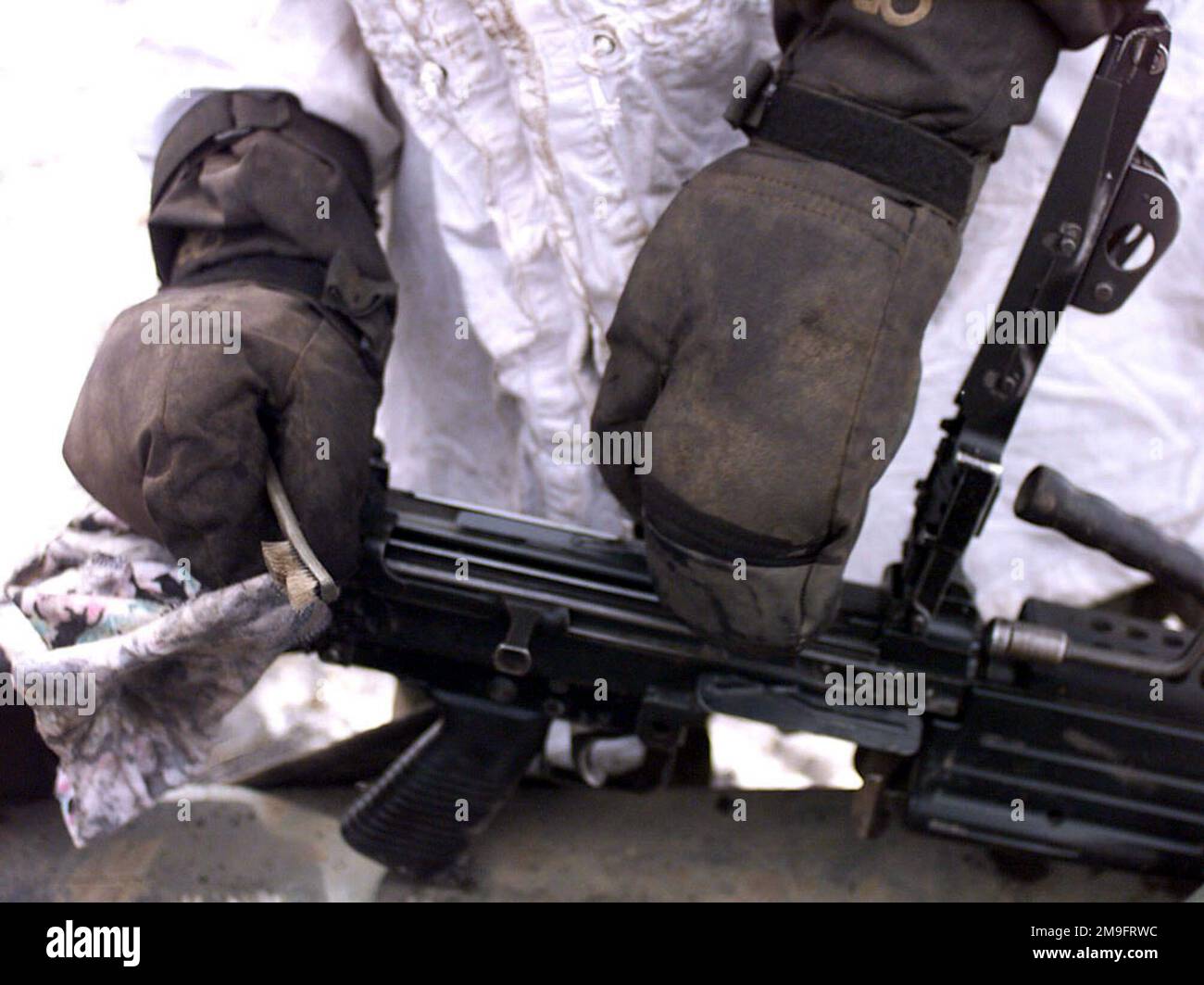 Lance Corporal Richard Colletta performs weapons maintenance on his .50 ...