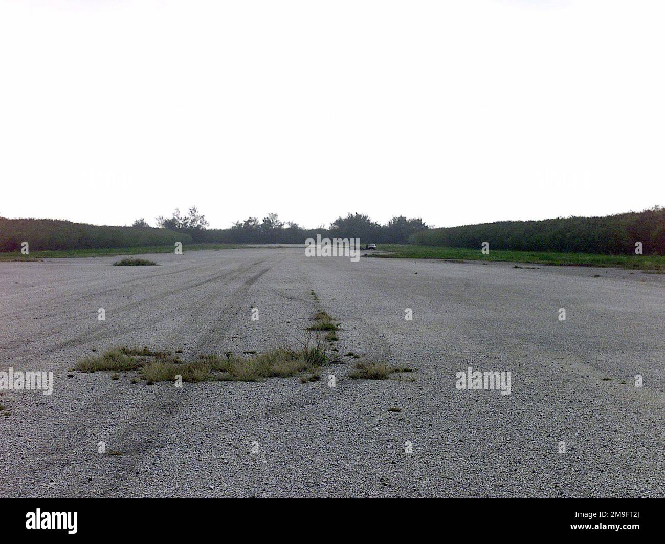 Low ground shot of the most Northern and active runway on Tinian Island ...