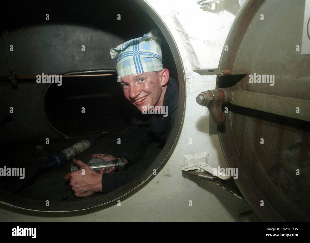 US Navy AIRMAN Richard Bailey cleans Aircraft Landing and Recovery ...