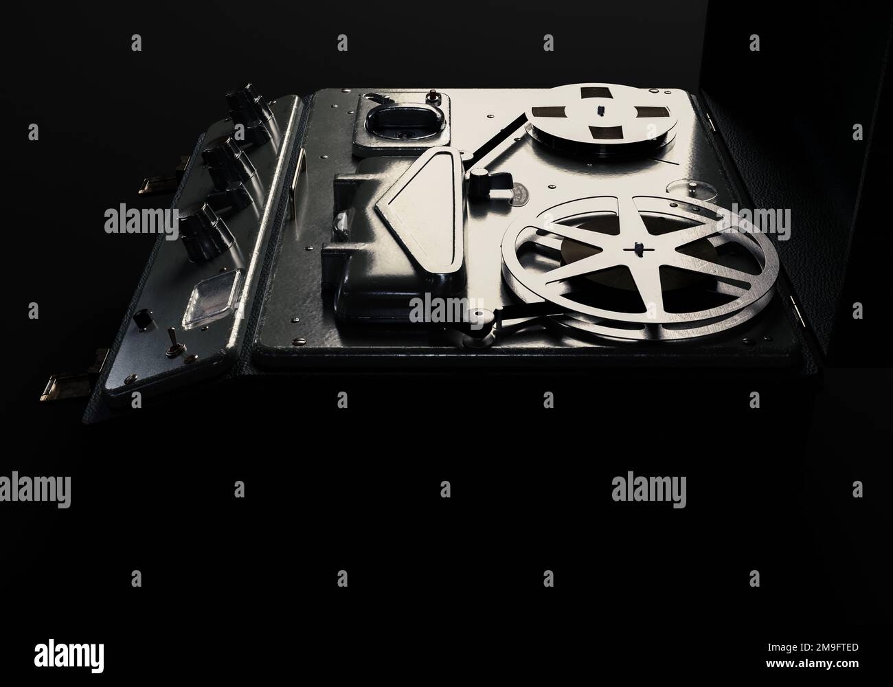 A vintage reel-to-reel analogue analogue audio recorder in a leather ...