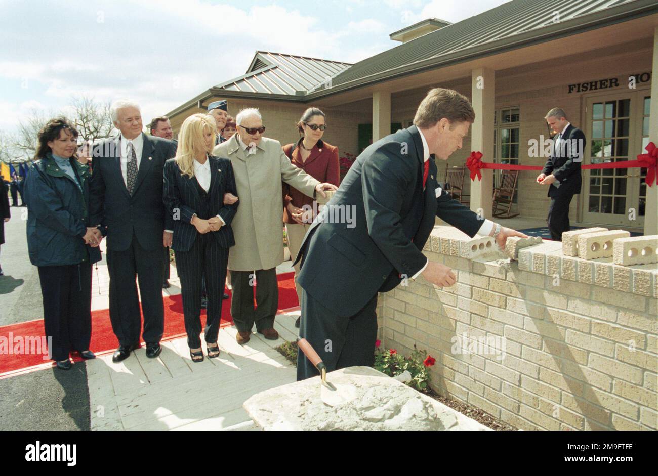 Congressman Bill Young, Mrs. Tammy Fisher and Mr. Michael Stein observe ...
