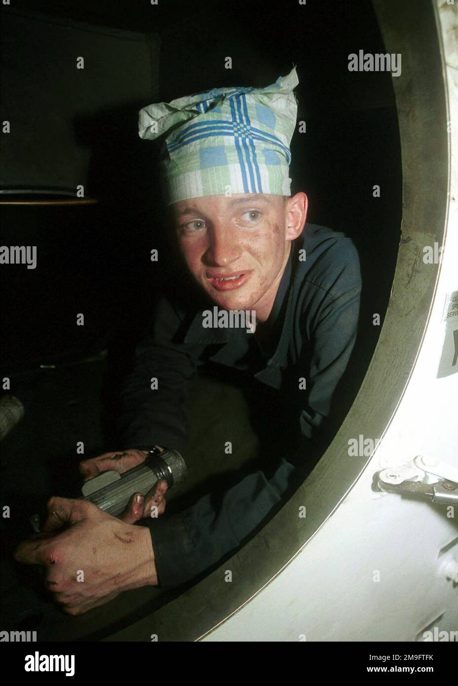 US Navy AIRMAN Richard Bailey cleans Aircraft Landing and Recovery ...