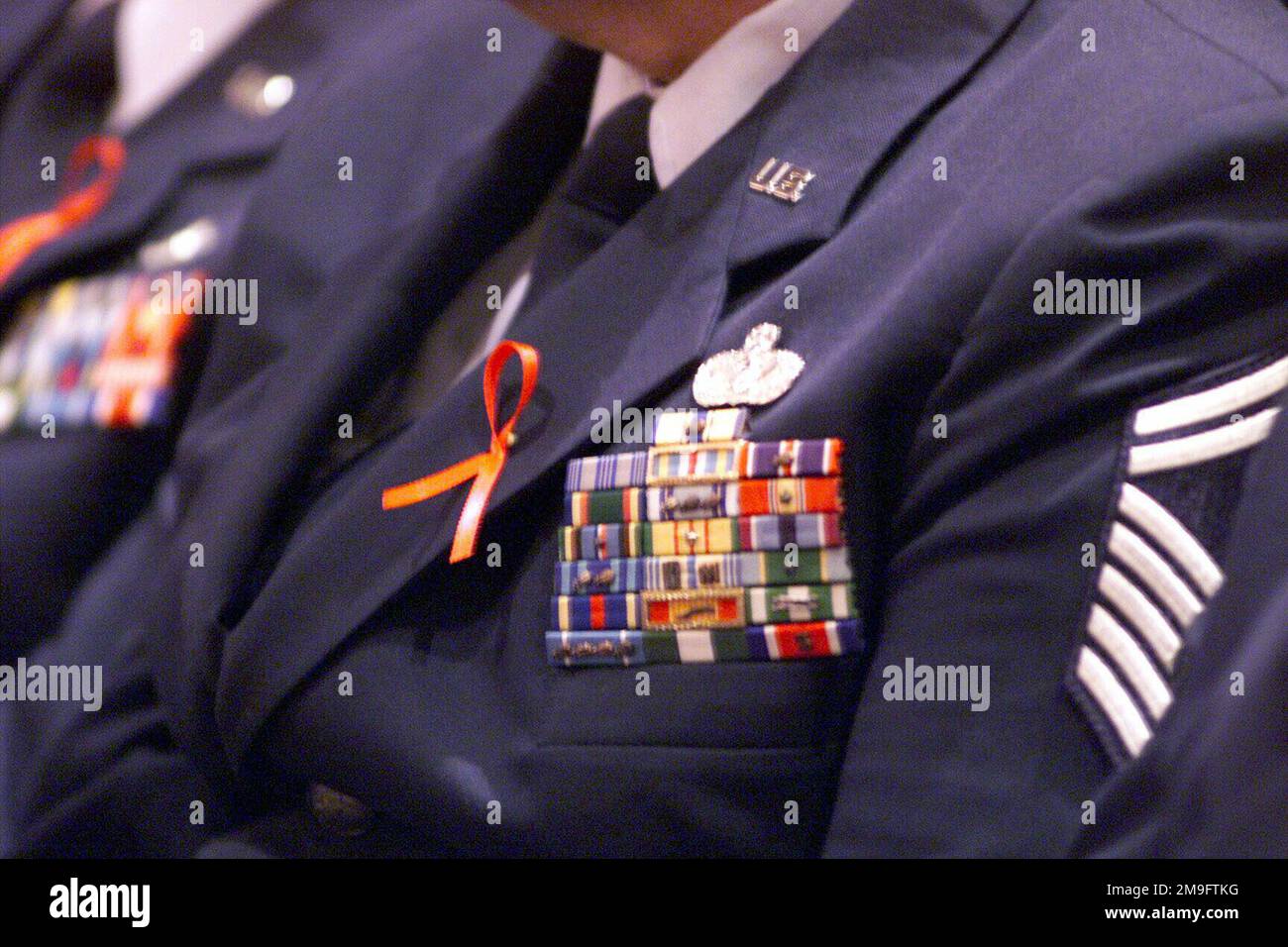 Close-up shot of the ribbons being worn by friends and family members ...
