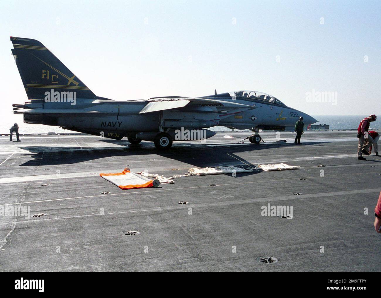 An F-14 Hornet from Fighter Squadron Thirty-Two (VF-32), "Swordsmen ...