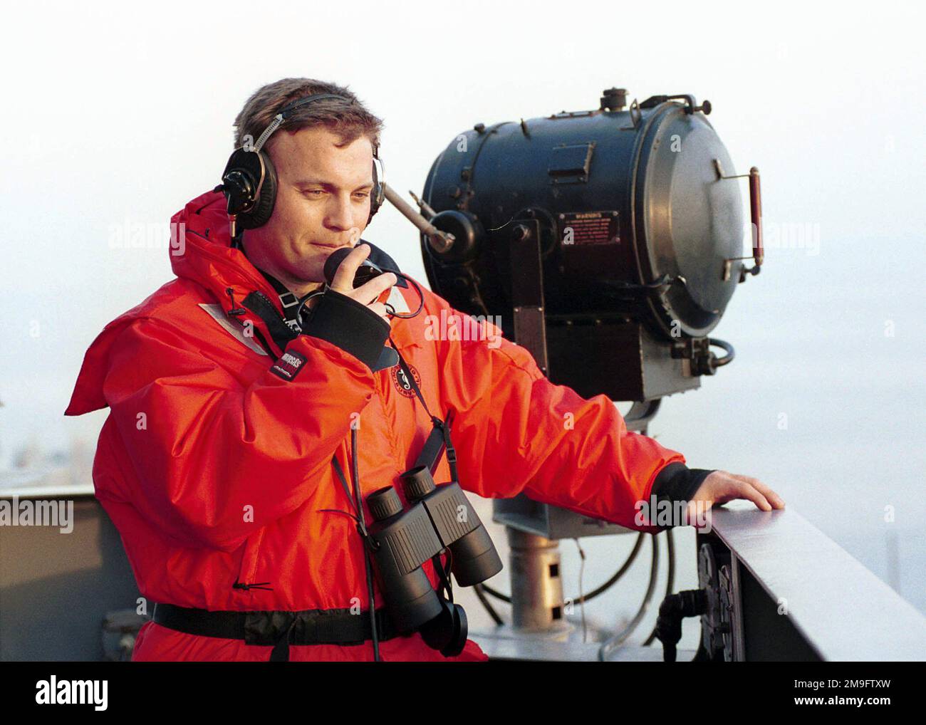 Operations SPECIALIST Third Class Mark Mahan talks on a sound-powered ...