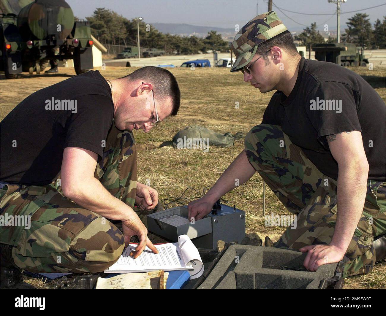 Preparing to measure the ground for its stability, US Air Force SENIOR ...