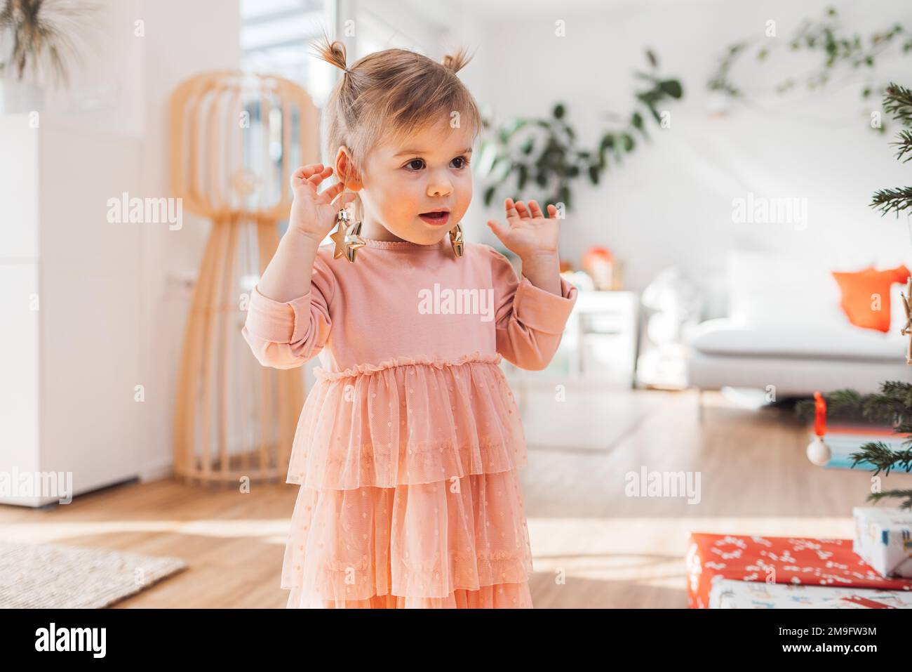 Kid wearing christmas hat hi-res stock photography and images - Alamy