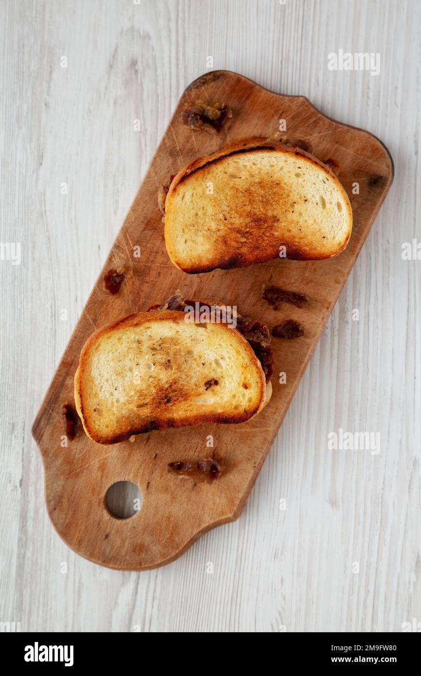 Homemade British Bacon Sandwich on a rustic wooden board, top view ...