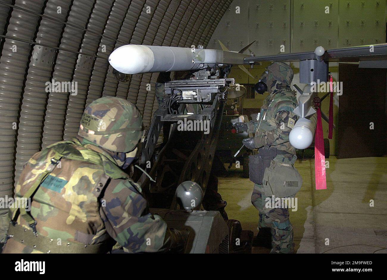 US Air Force AIRMAN First Class Adam Wright is guided by US Air Force ...