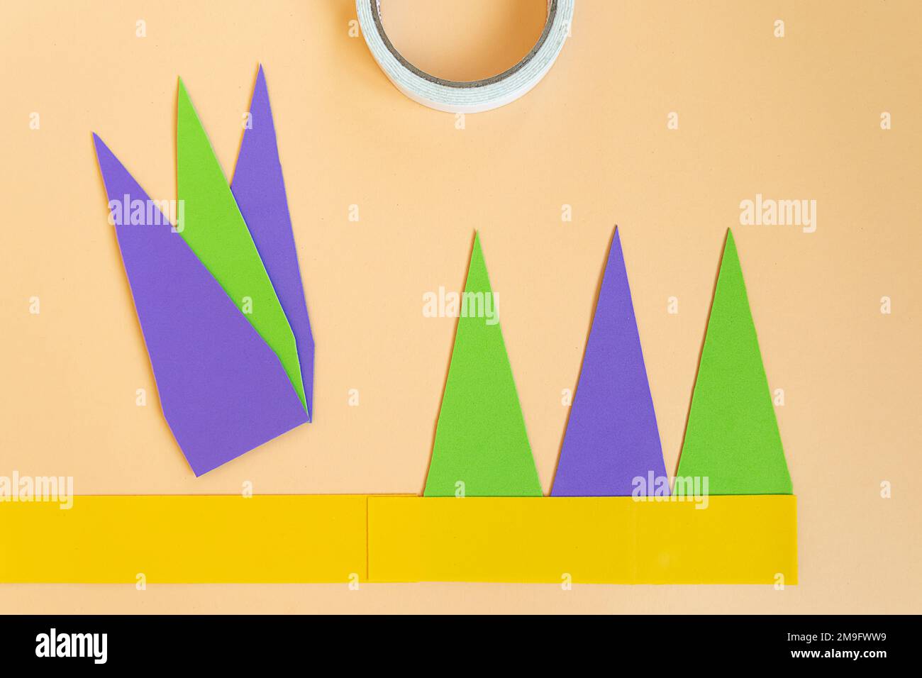 Mardi gras carnival jester hat on head made of paper . Step by step ...