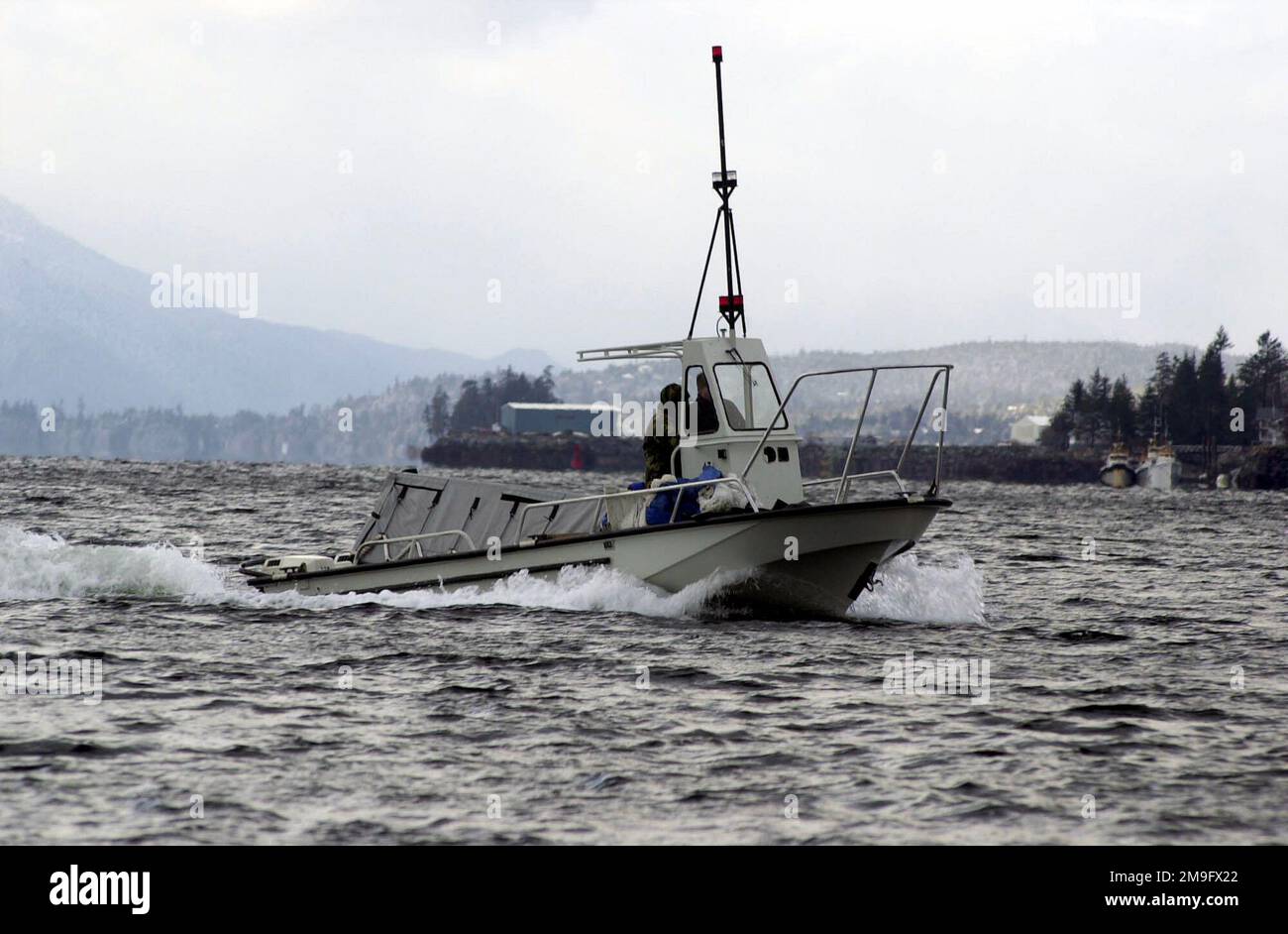 Members of the Navy Explosive Ordnance Mobile Unit 3, Detachment 6 ...