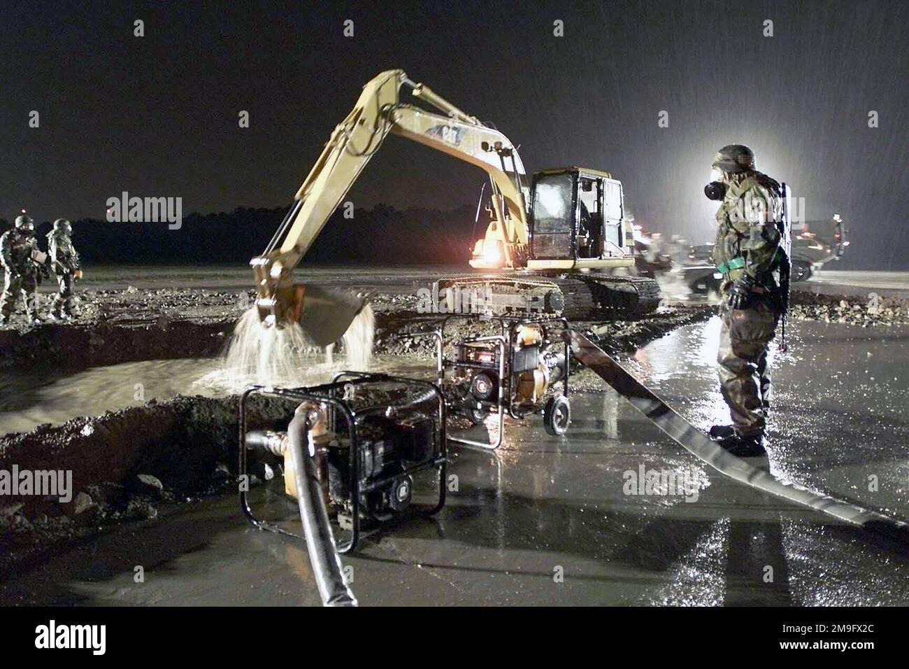 Members of the 1ST Civil Engineering Squadron Rapid Runway Repair team ...