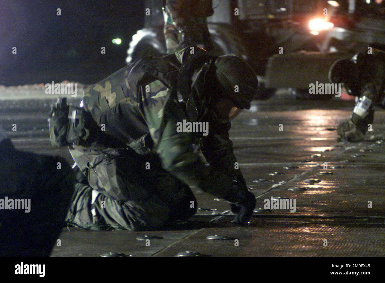 A US Air Force AIRMAN from the 1ST Fighter Wing, Langley AFB, Virginia ...