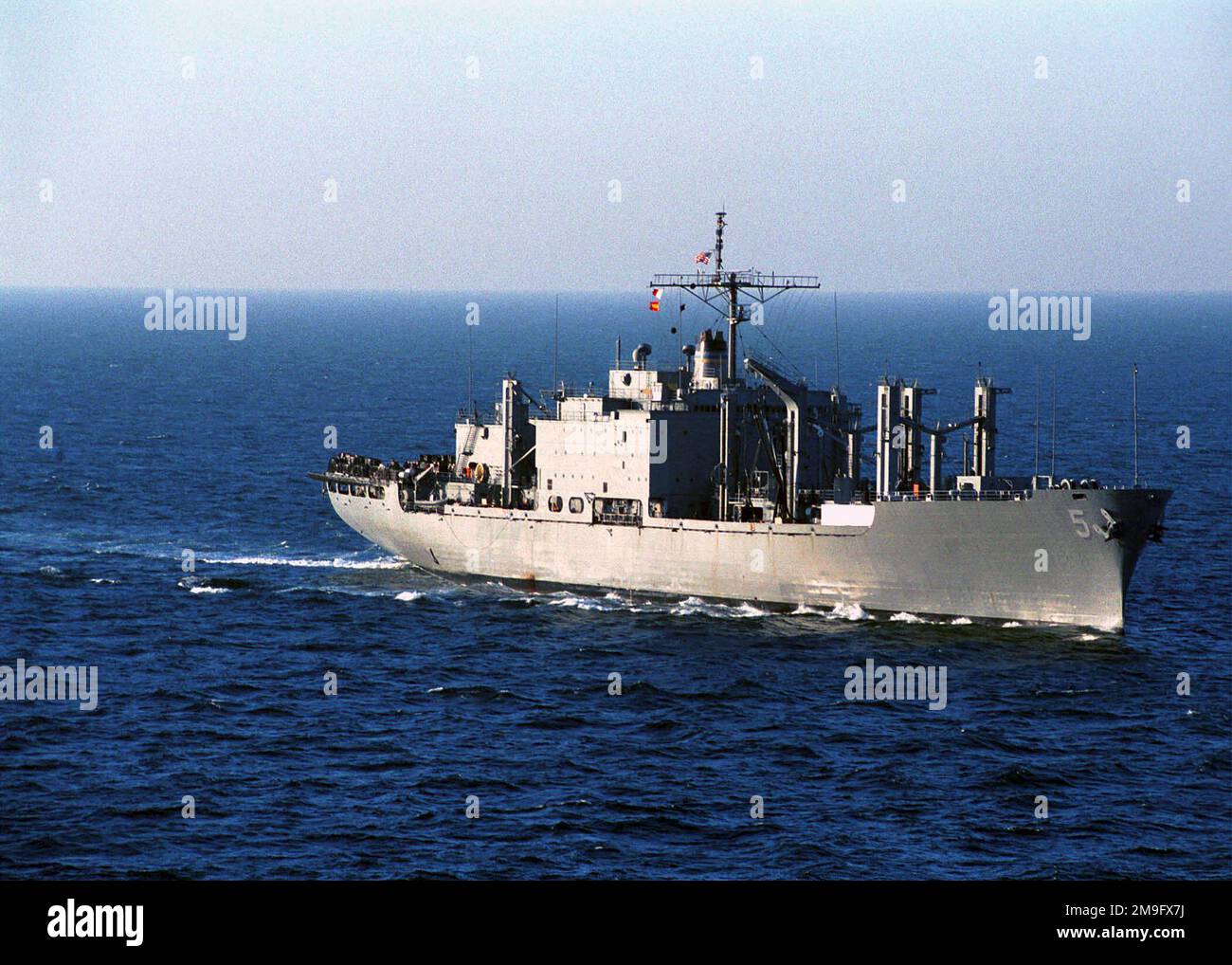 US Naval Ships (USNS) Concord (T-AFS 5) sets course alongside USS Harry ...