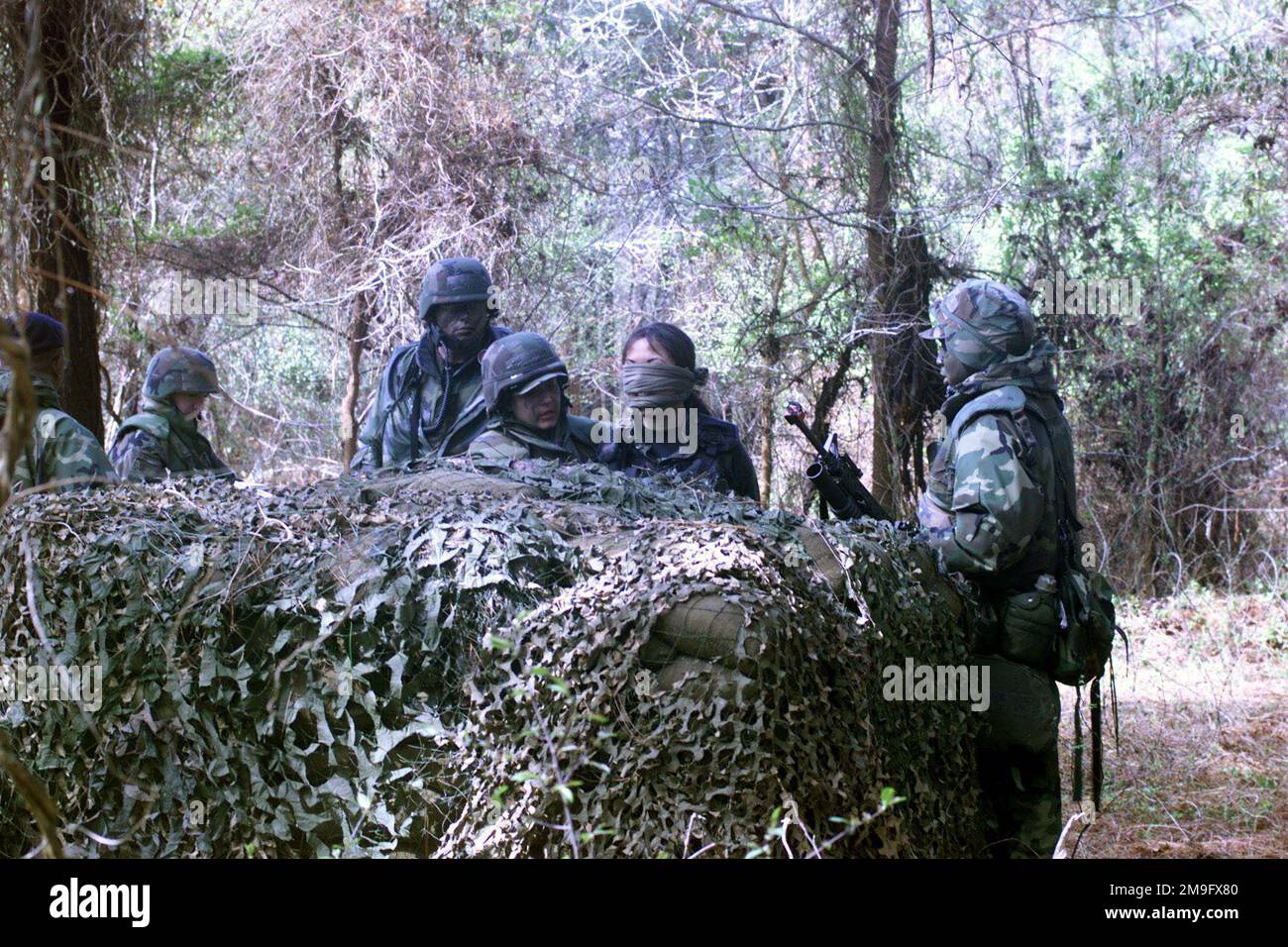 US Air Force AIRMAN First Class Jennifer Johnson and other personnel of ...