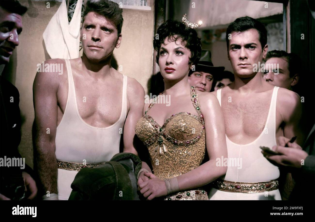 TRAPEZE 1956 United Artists film with Gina Lollobrigida. Burt Lancaster at left and Tony Curtis ...