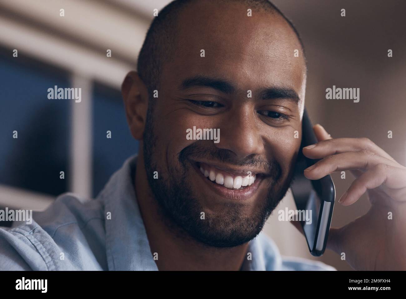 Being a night owl has its benefits. a young businessman using his ...