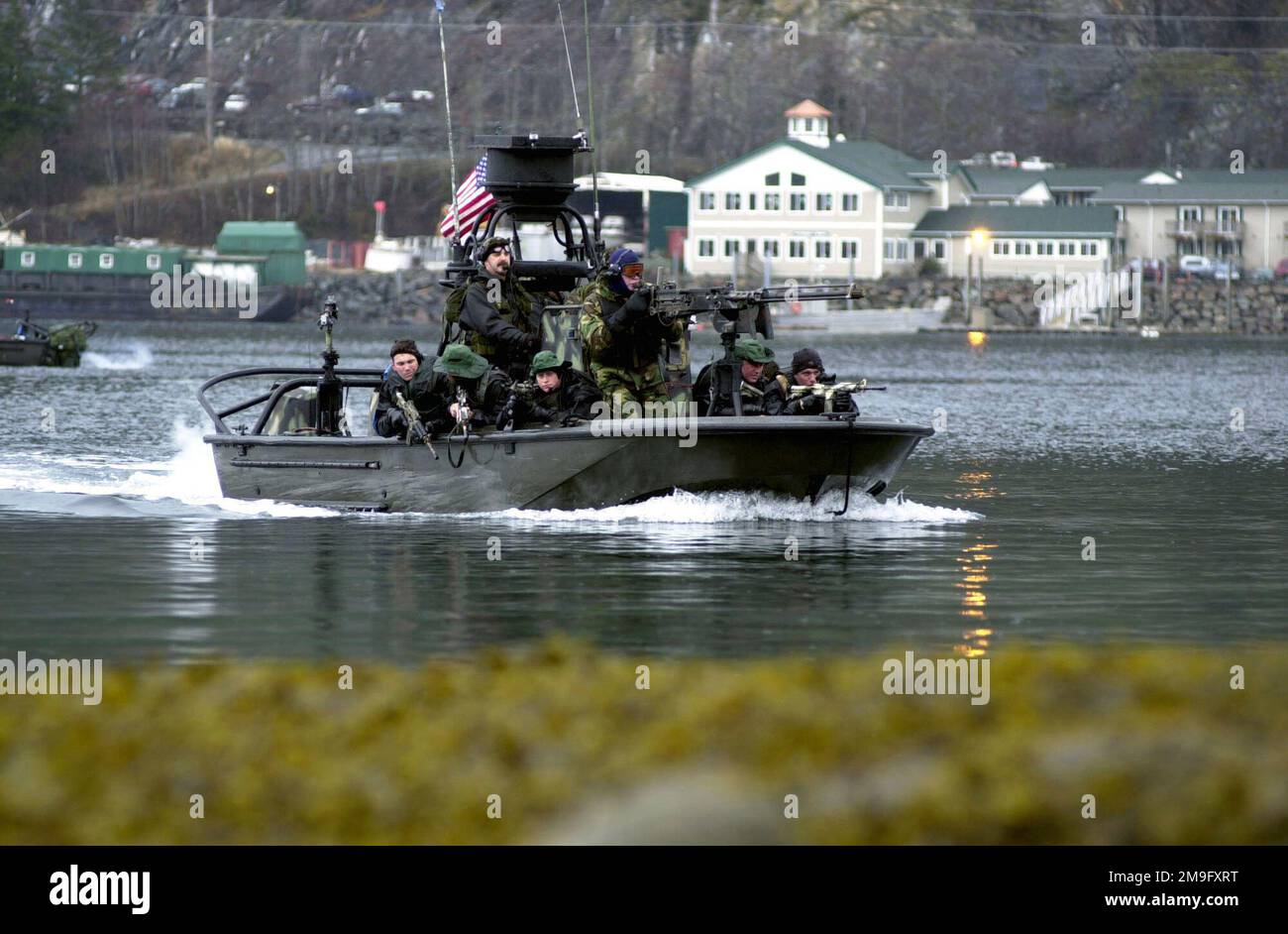 A boat from the Navy Special Boat Unit 22, Sacramento, California ...