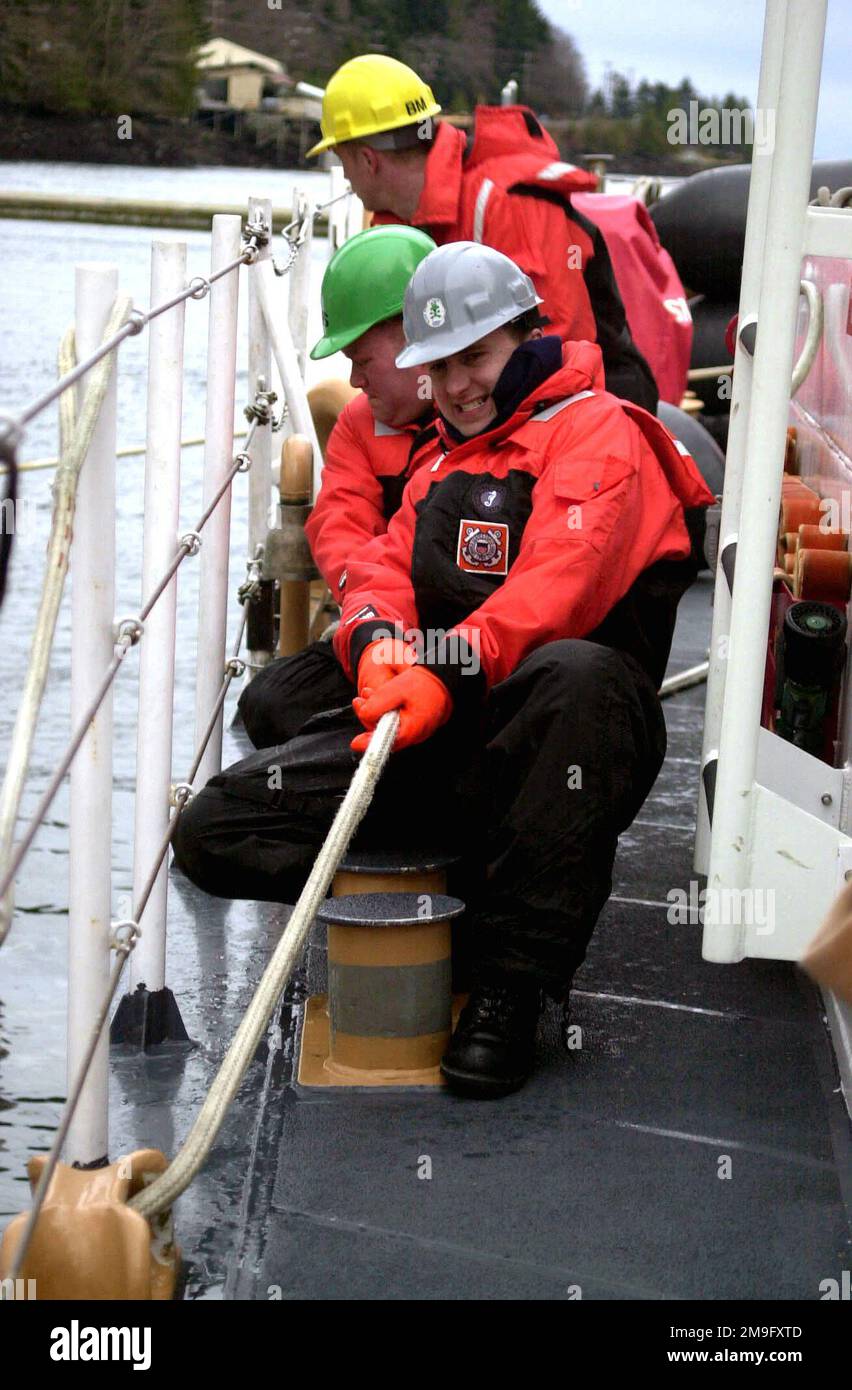 US Coast Guard SEAMAN Jonathan Trusty and US Coast Guard SEAMAN John ...