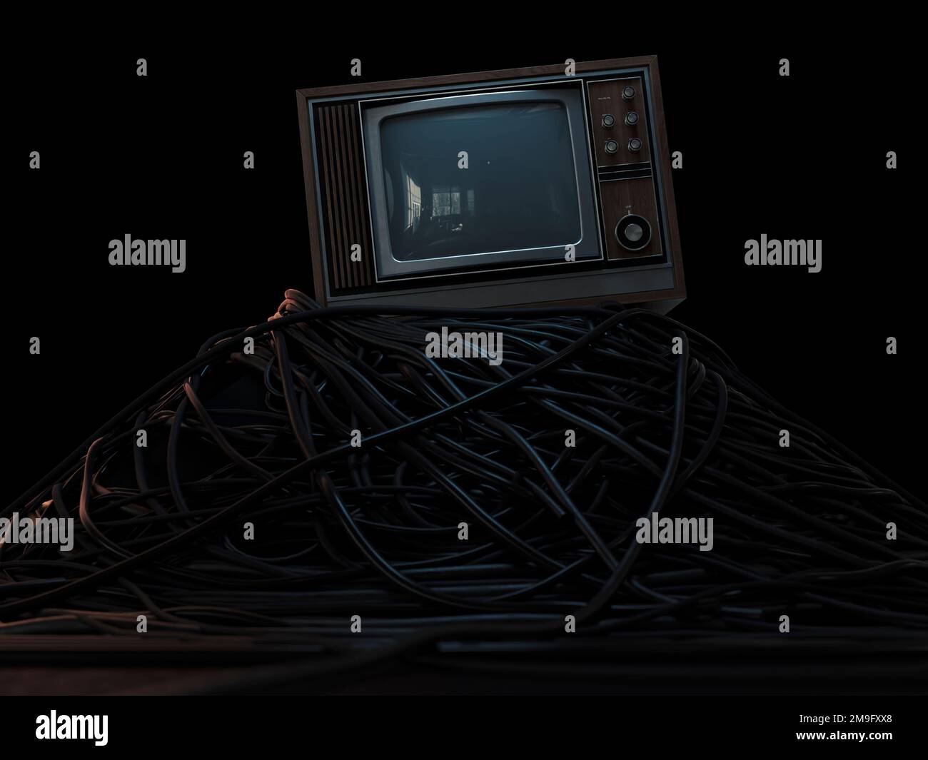 A vintage 80's television perched on a jumbled pile of black cables on ...