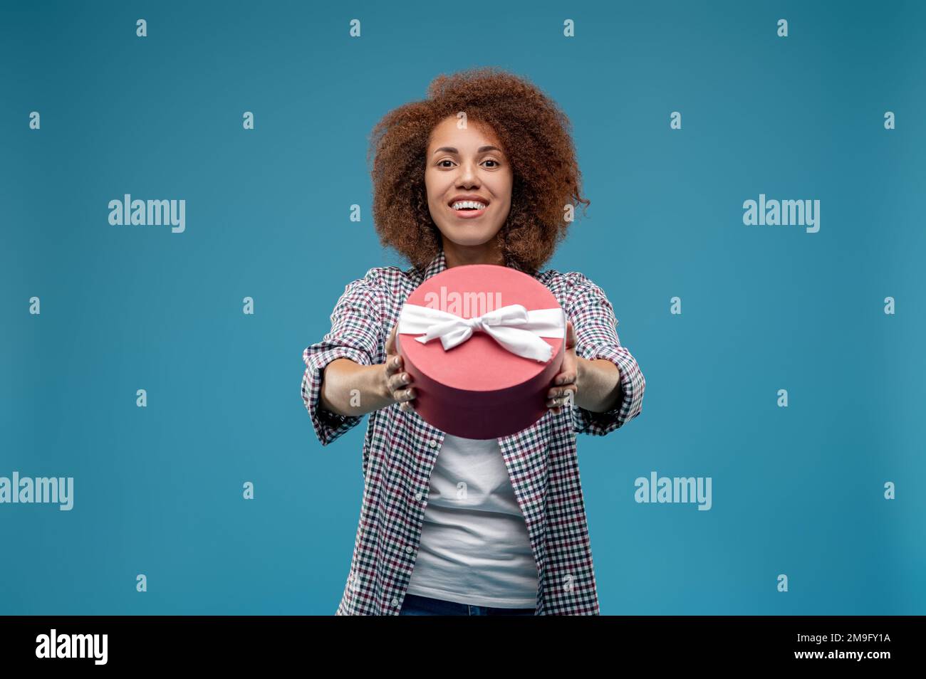 Photo cute cheerful curly hi-res stock photography and images - Alamy
