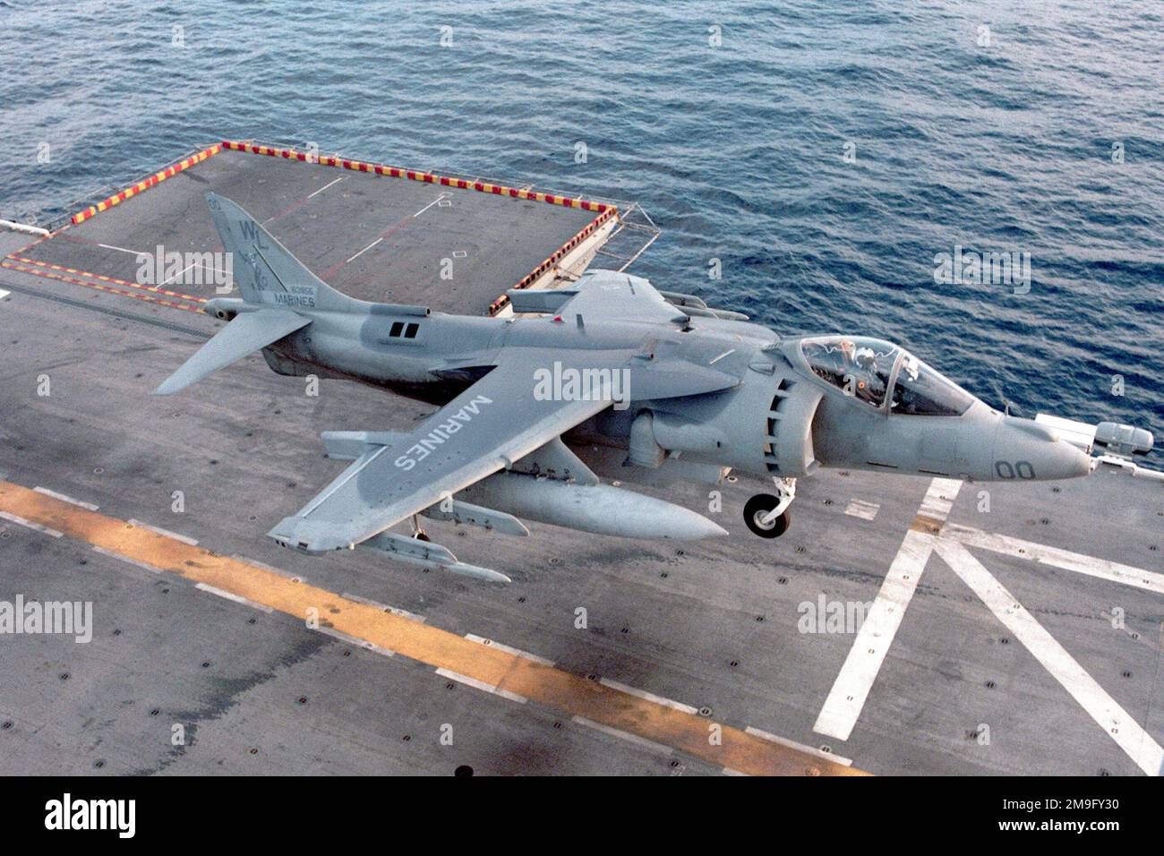 Shot of an AV-8B Harrier aircraft landing during flight operations ...