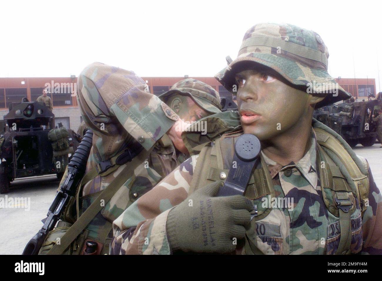 US Marine Corps (USMC) Lance Corporal (LCPL), Chris Castro (foreground ...