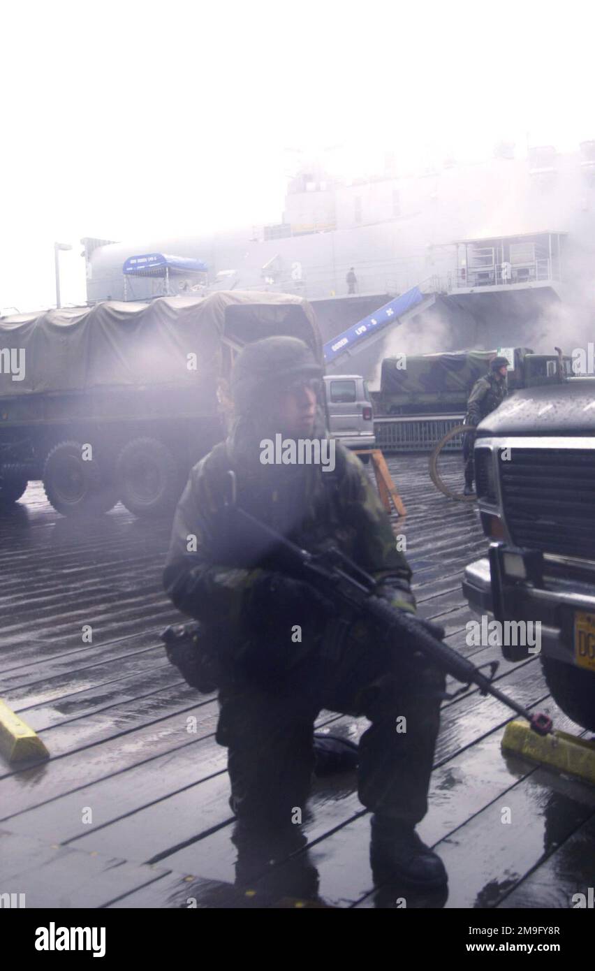 In swirling winds, fog and pounding rains, Sergeant Matt Roeber of the ...