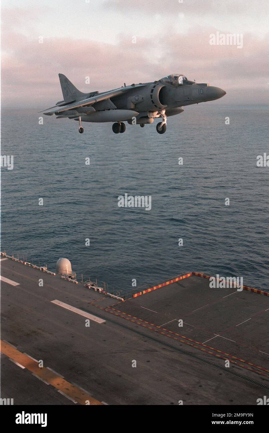 An AV-8B Harrier aircraft lands aboard the USS TARAWA (LHA 1) during ...