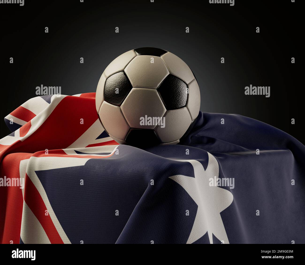 A regular soccer balls resting on an Australia flag draped over a ...