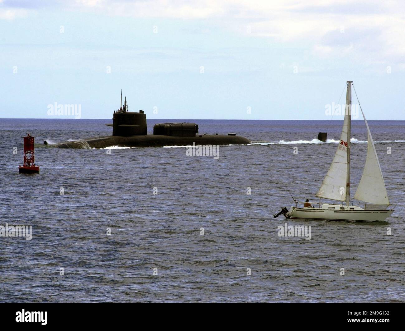 A port side view of the USS KAMEHAMEHA (SSN 642) underway as it enters ...