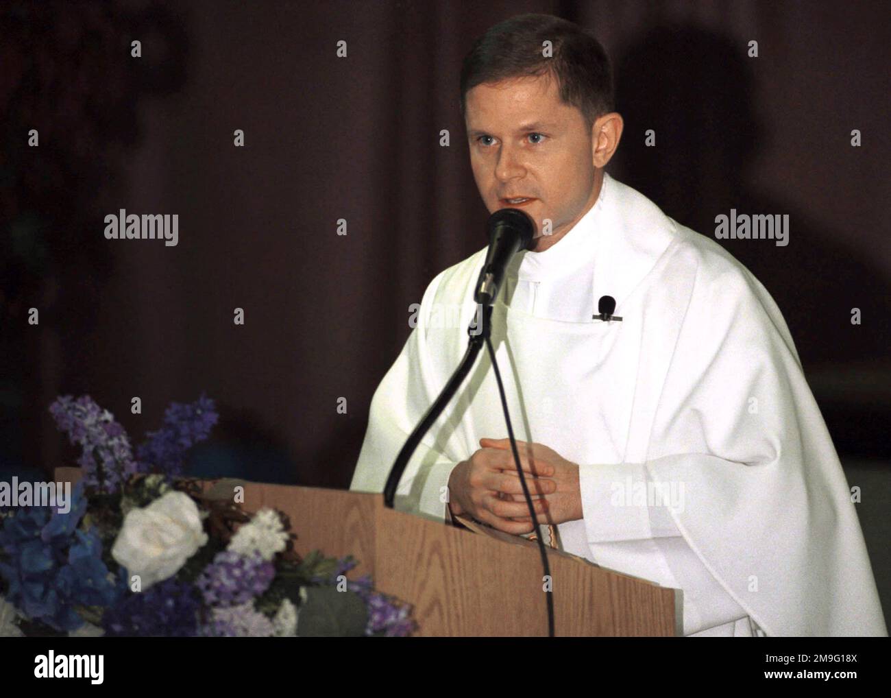 US Navy Chaplain Lieutenant Commander Robert Coyle leads an Easter Mass ...