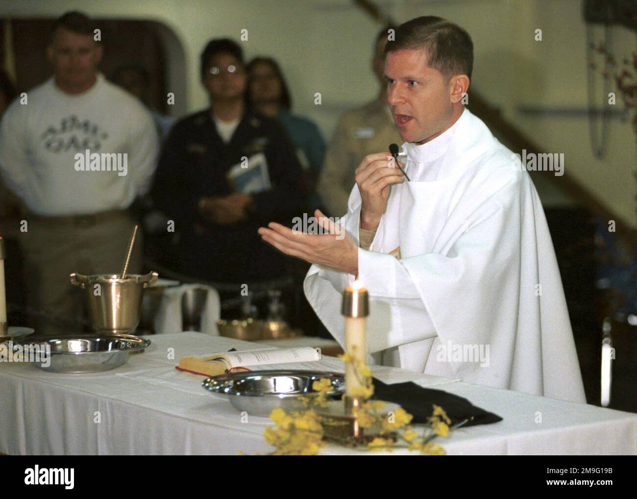 US Navy Chaplain Lieutenant Commander Robert Coyle leads Easter Mass in ...