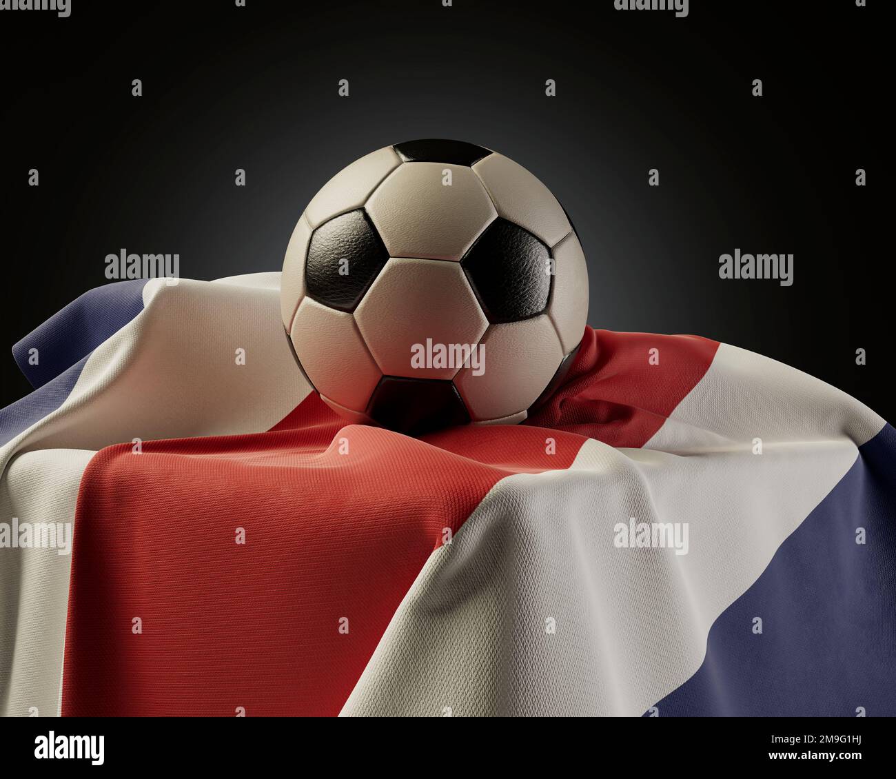 A regular soccer balls resting on a Costa Rica flag draped over a ...
