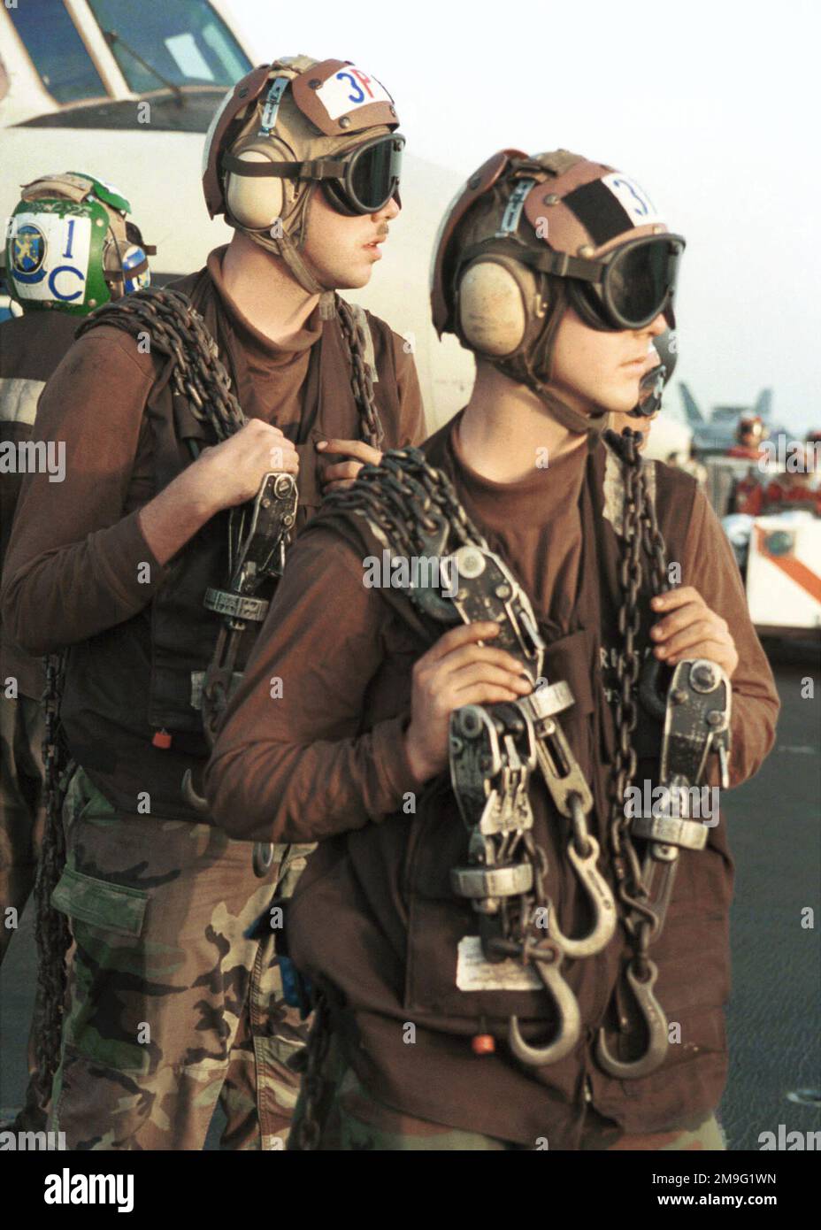 US Navy AIRMAN Michael Thompson and US Navy AIRMAN Apprentice Logan ...