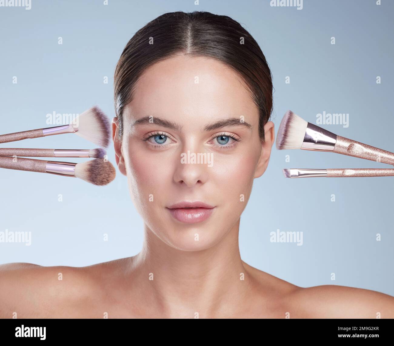 Choose the brush that suits the occasion. Studio portrait of an ...