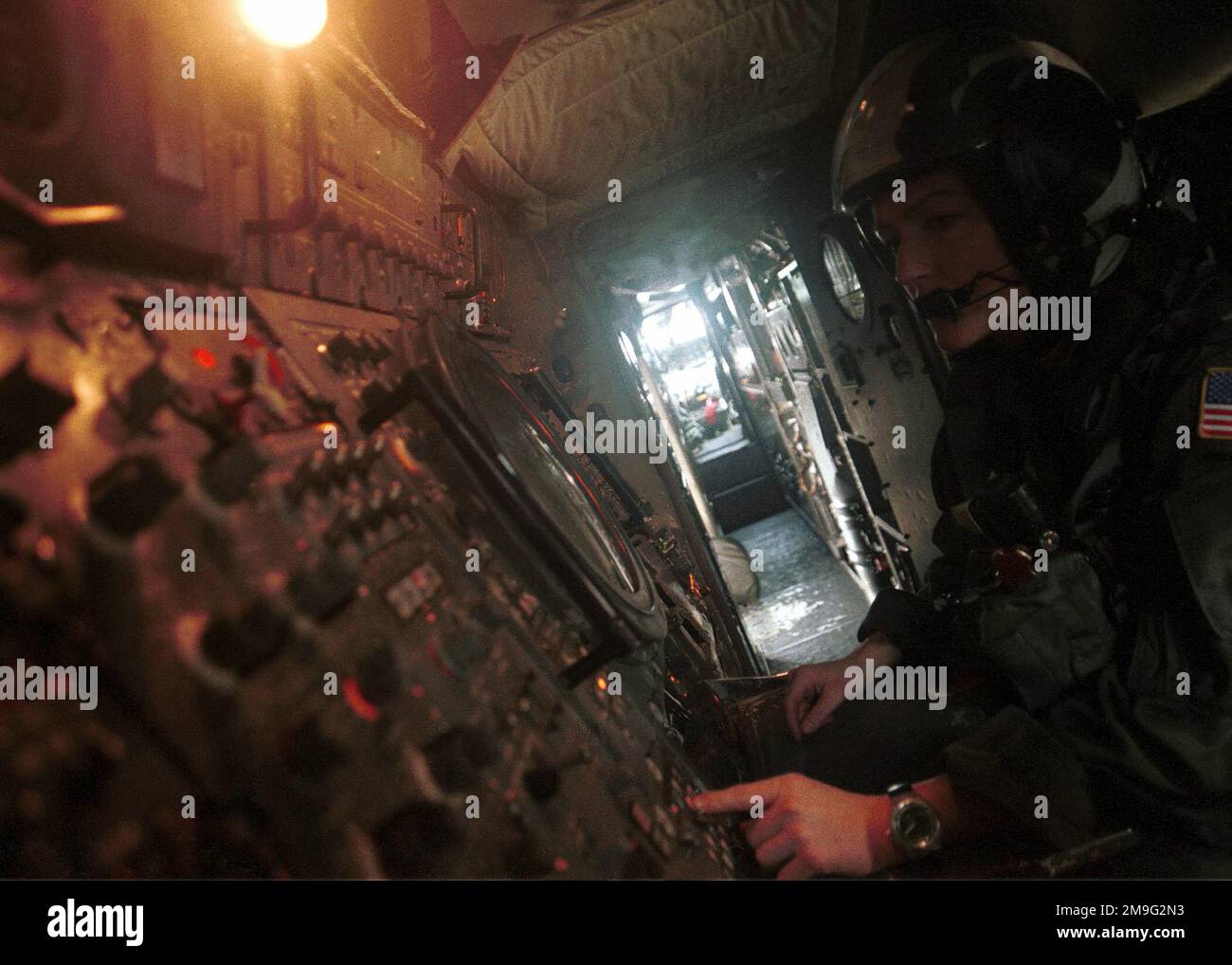 US Navy Lieutenant Junior Grade Tara "Judy" Golden monitors a ...