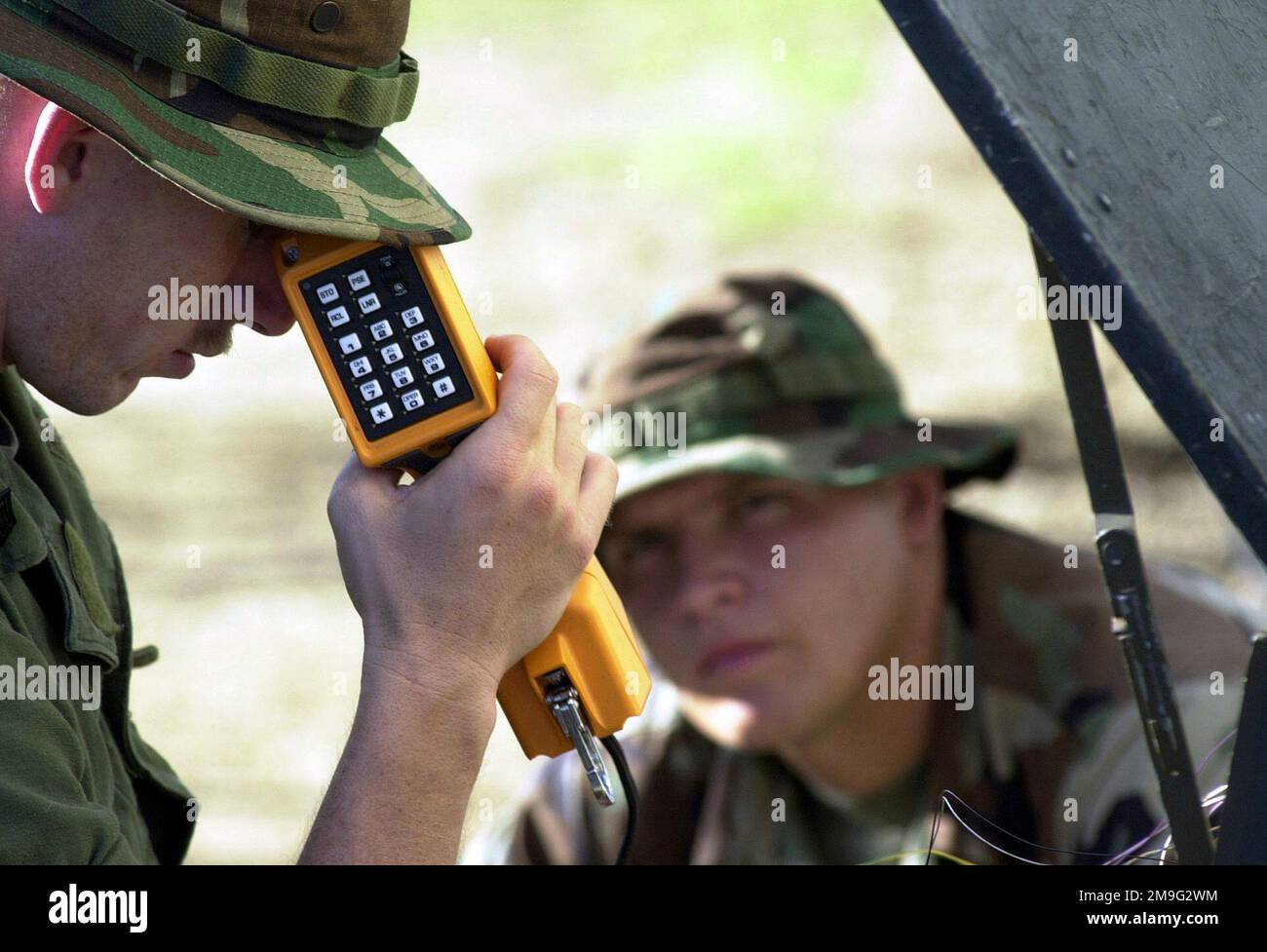 010427-F-1644L-004. [Complete] Scene Caption: Sergeant J. D. Mills ...