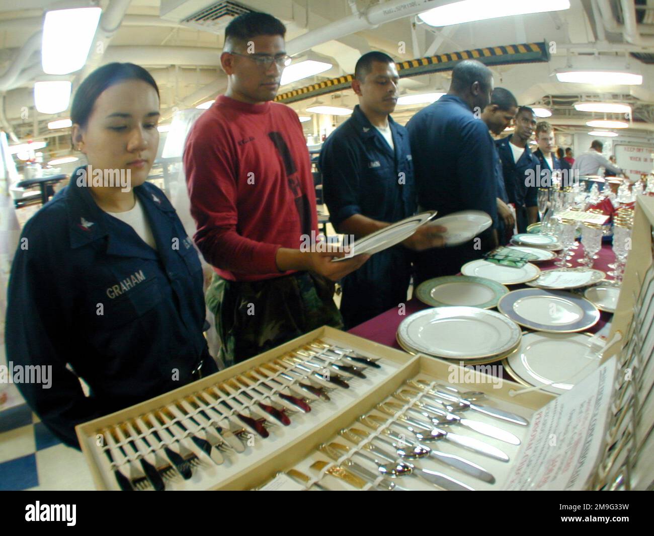 (from left to right) US Navy Mess SPECIALIST Third Class Miranda Graham ...
