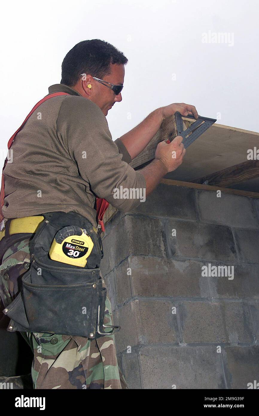 US Air Force STAFF Sergeant Kenny Edwards, from the 823rd Red Horse ...