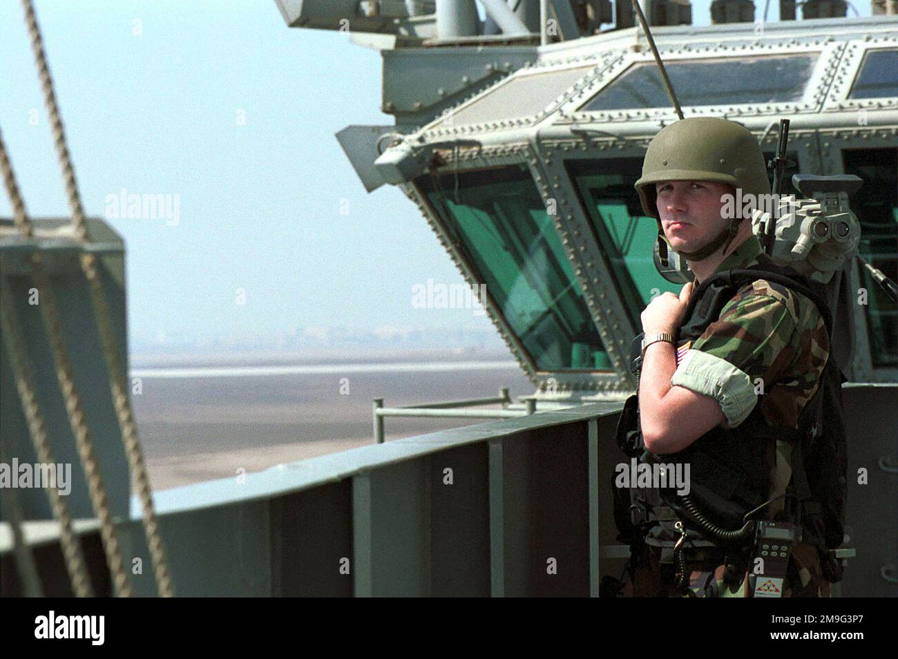 US Navy Storekeeper Second Class John Gottshall stands a force ...