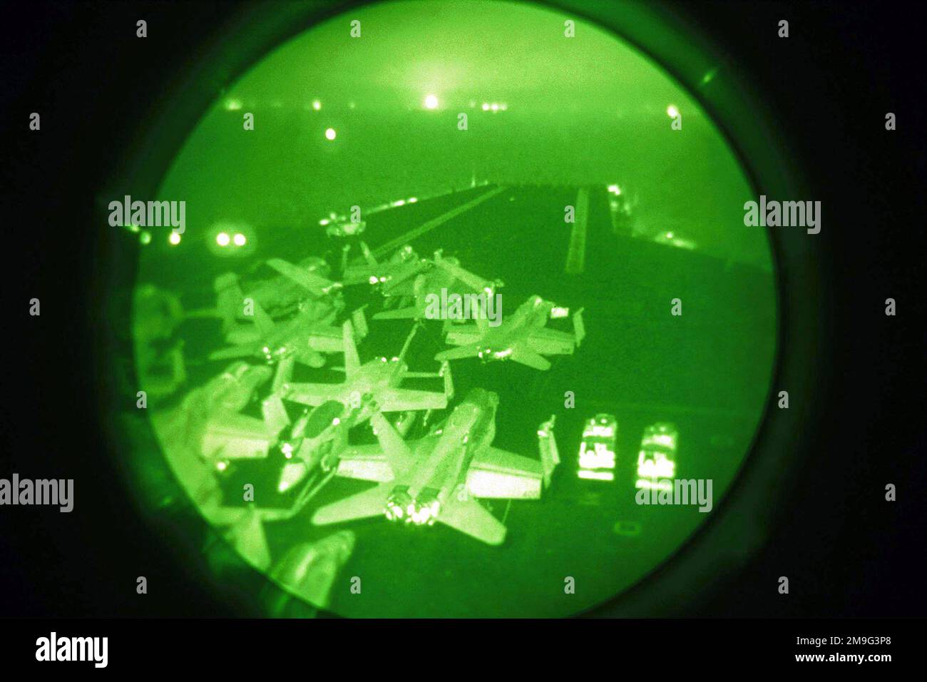 Cropped night vision shot of the flight deck of USS HARRY S. TRUMAN ...