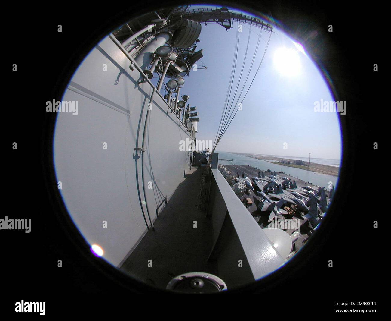 Fish eye lens view of Sailors standing lookout watch on the signal ...